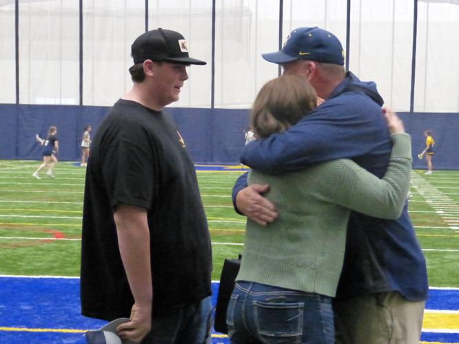 Cadott teen reconnects with UWEC coach who saved his life | Catering ...