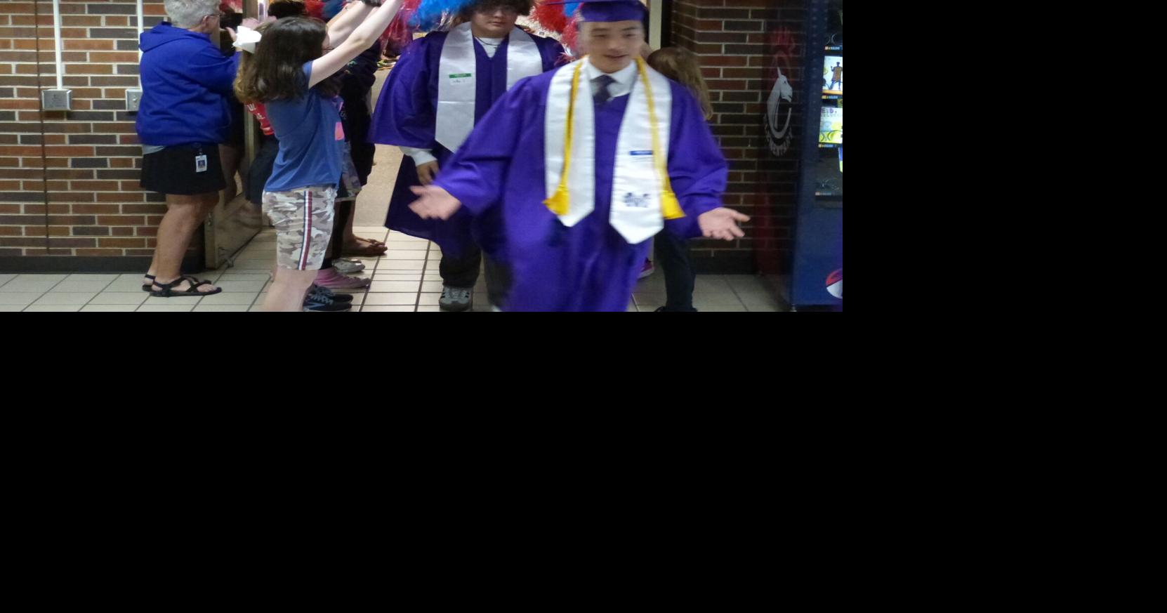 ECASD students walk their former elementary school halls just before ...