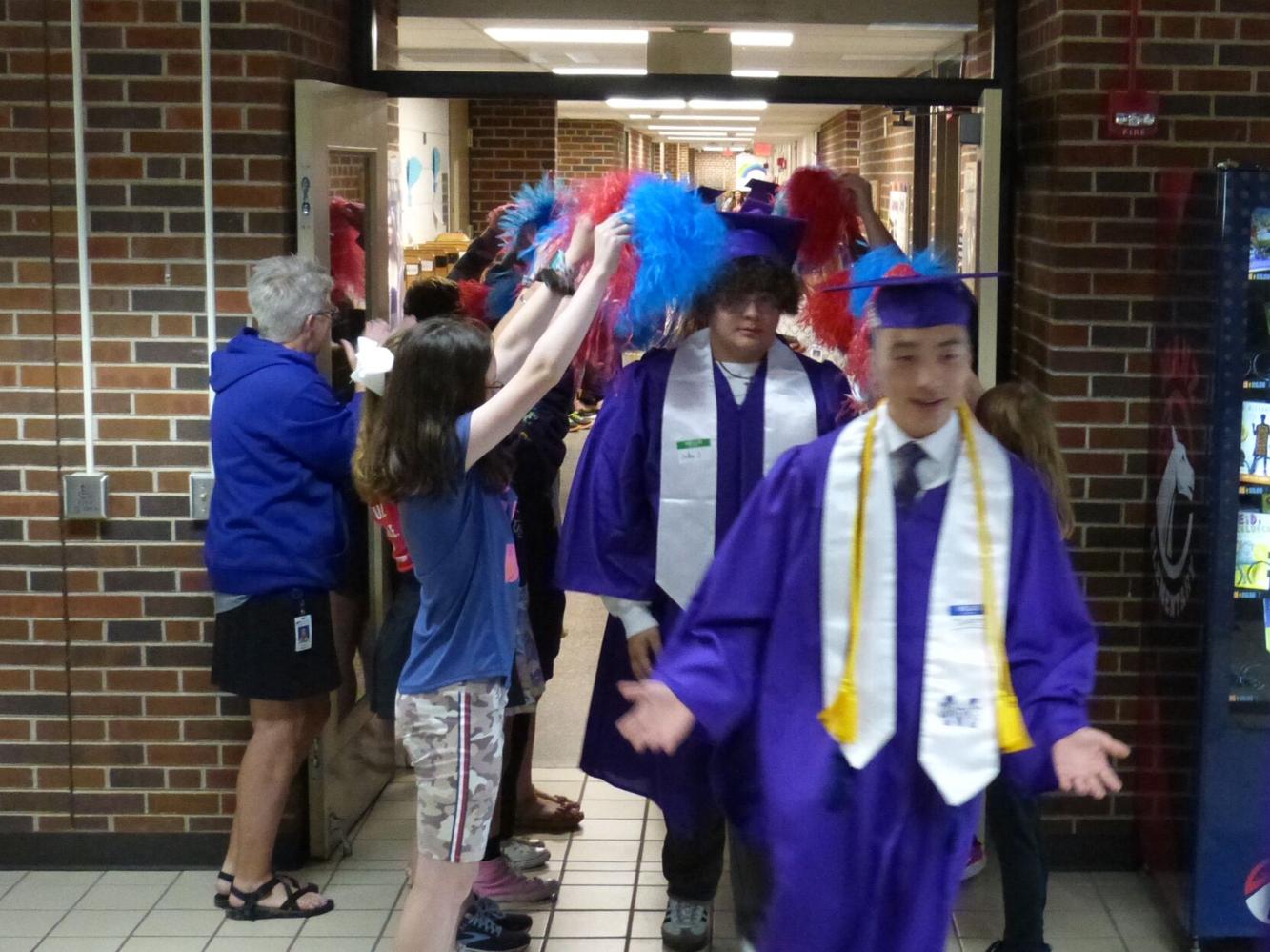 ECASD students walk their former elementary school halls just before ...