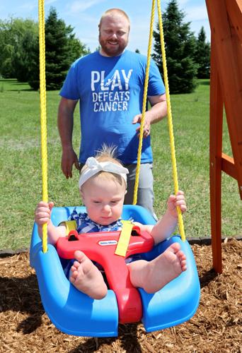 Recovering from cancer, one-year-old girl receives play set | Front ...