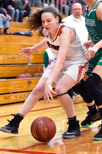 Girls basketball: Karlstad fights through fouls to lift Regis over ...