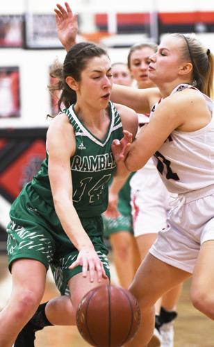 Girls basketball: Karlstad fights through fouls to lift Regis over ...