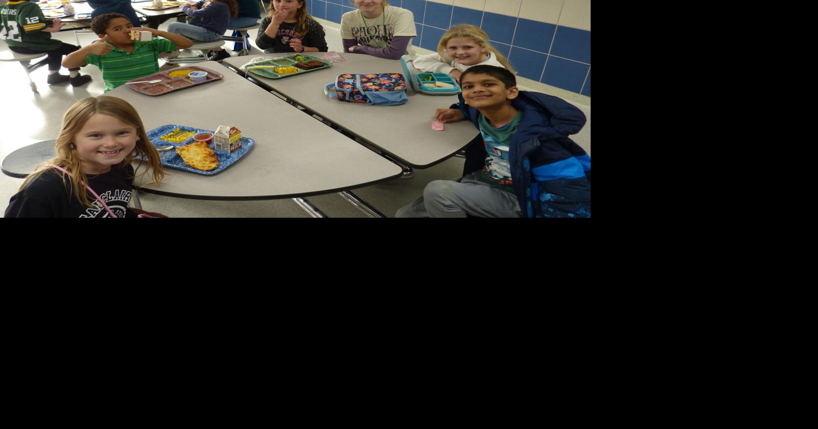 College and elementary students share a lunch in the Putnam Lunch Bunch ...