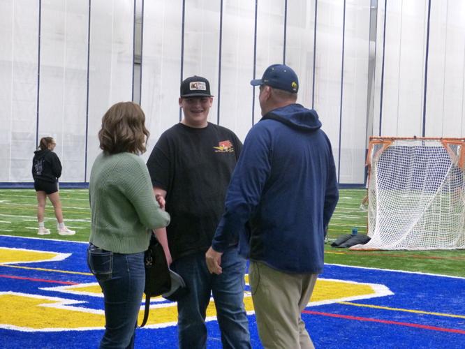 Cadott teen reconnects with UWEC coach who saved his life | Catering ...