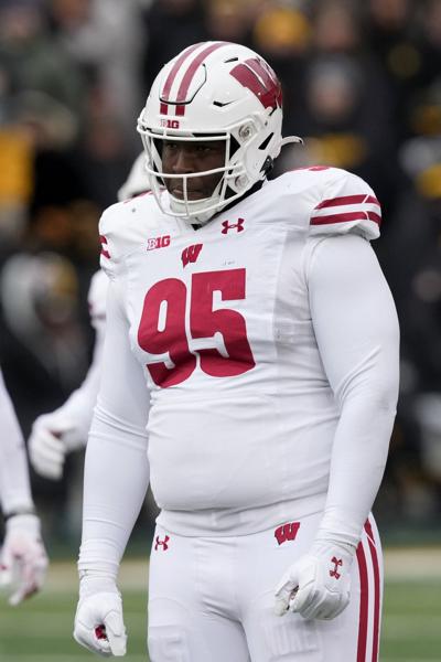 Why Wisconsin football's Keeanu Benton has so much riding on the Senior ...