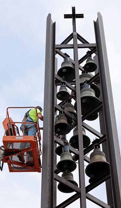 Fixing a bell | Local News | leadertelegram.com