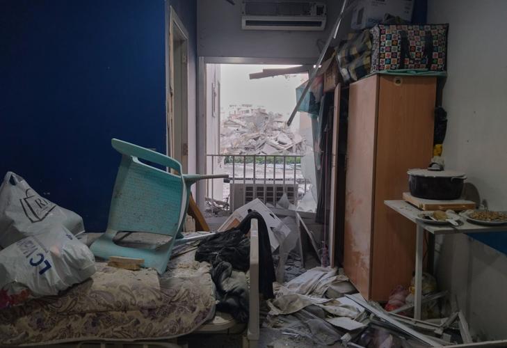 A Lebanese hospital is in ruins and people flee a Beirut suburb after ...