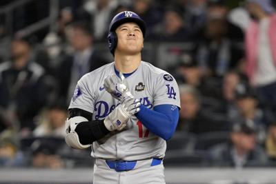 Shohei Ohtani returns after dislocating shoulder, goes hitless as Dodgers take 3-0 World Series ...