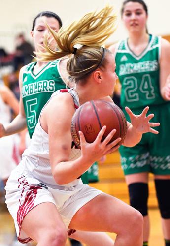 Girls basketball: Karlstad fights through fouls to lift Regis over ...