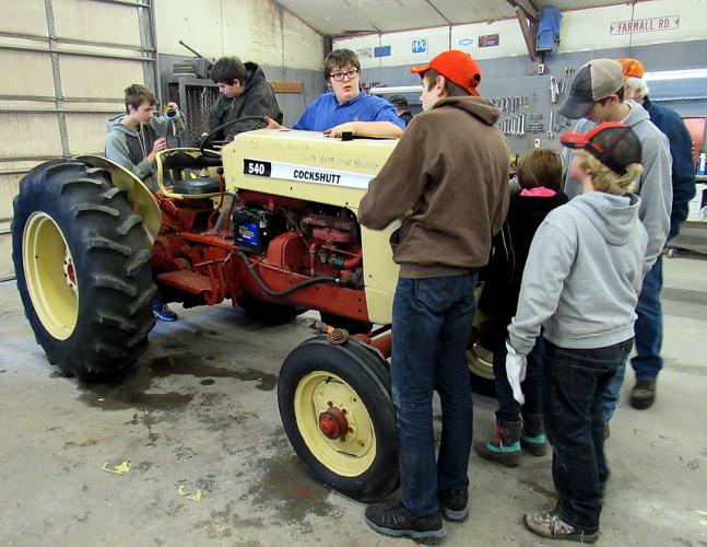 Annual project allows young people to dig into tractor restoration ...