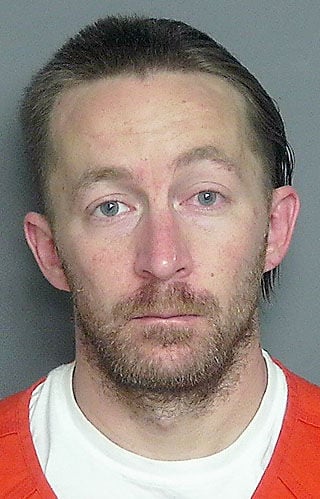 Man, his mother charged over 2-hour standoff | Front Page ...