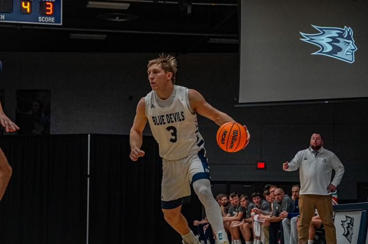 RIVALS SPLIT ON HARDCOURT: Renta’s stepback gives UW-EC men win ...