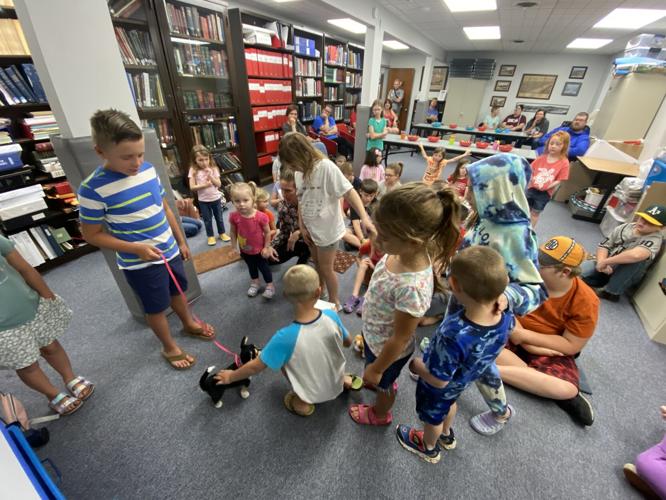 Children celebrate reading with humane police officer | News ...