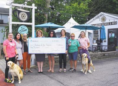 Peoples Natural Gas presented $1,000 to Orphans of the Storm animal ...