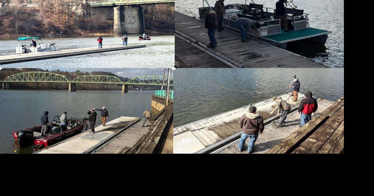 Volunteers move the docks to storage | News | leadertimes.com