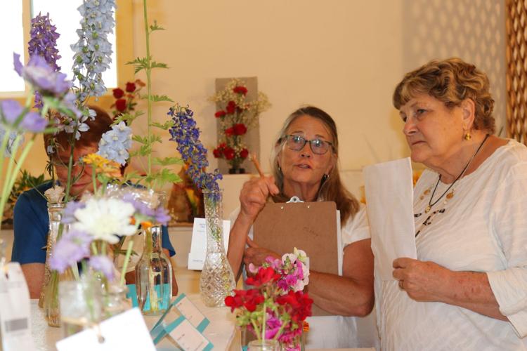Surrounded by beauty, floral judges try to pick the best of the best ...