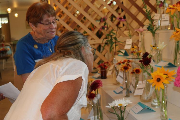 Surrounded by beauty, floral judges try to pick the best of the best ...
