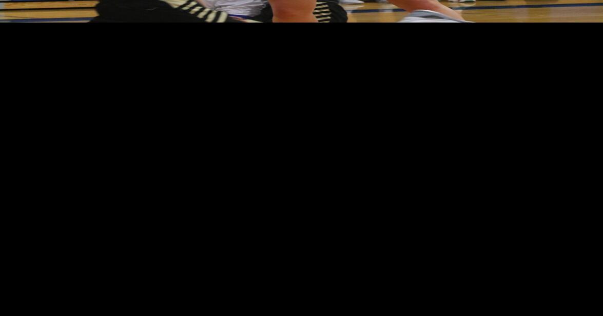 Overton girls win, boys lose at home to the Spartans