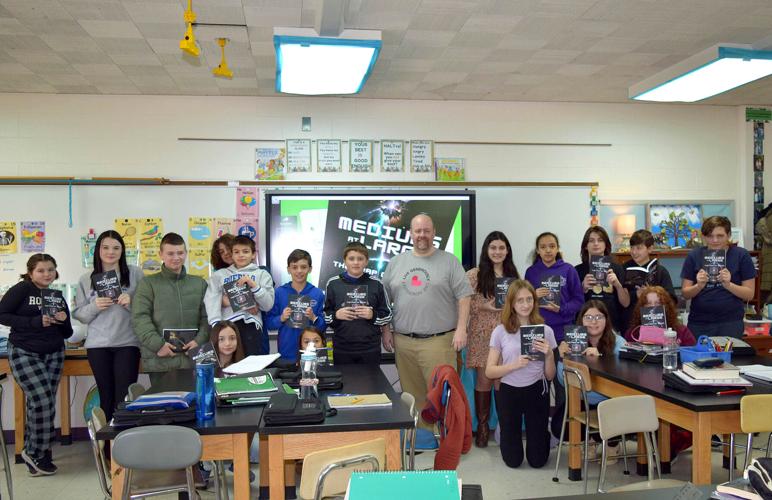 Grant allows author to share books with Roy-Hart Middle School ...