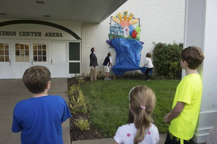 Children behind the creation of two new sculptures at Kenan Center ...