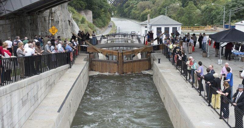 Crowds gather to see the restored Flight of Five locks in action ...