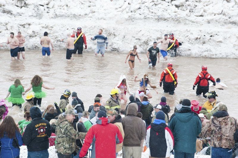 Swimmers Take To The Water At Polar Bear Swim Local News