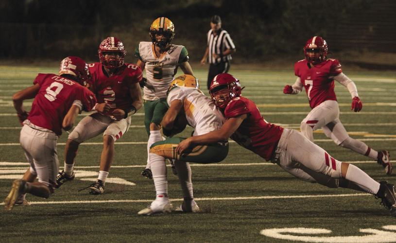 High school football: Lodi loses game and quarterback against Tracy ...