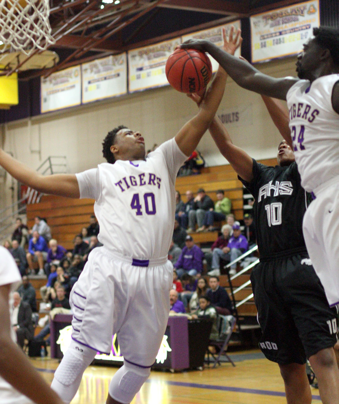 Boys basketball: Tigers feature new-look roster in win over Mustangs ...
