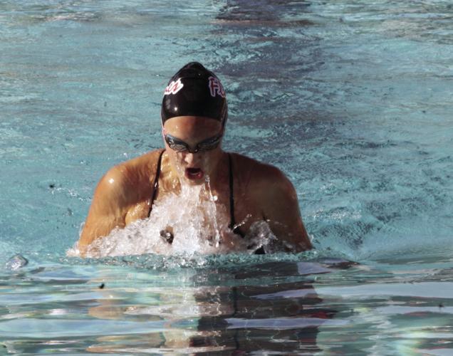 High school swimming: Woznick muscles her way to top finishes for ...