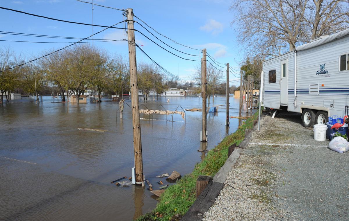 Troubled waters: Storm breaks levees, floods roads in Lodi area and ...