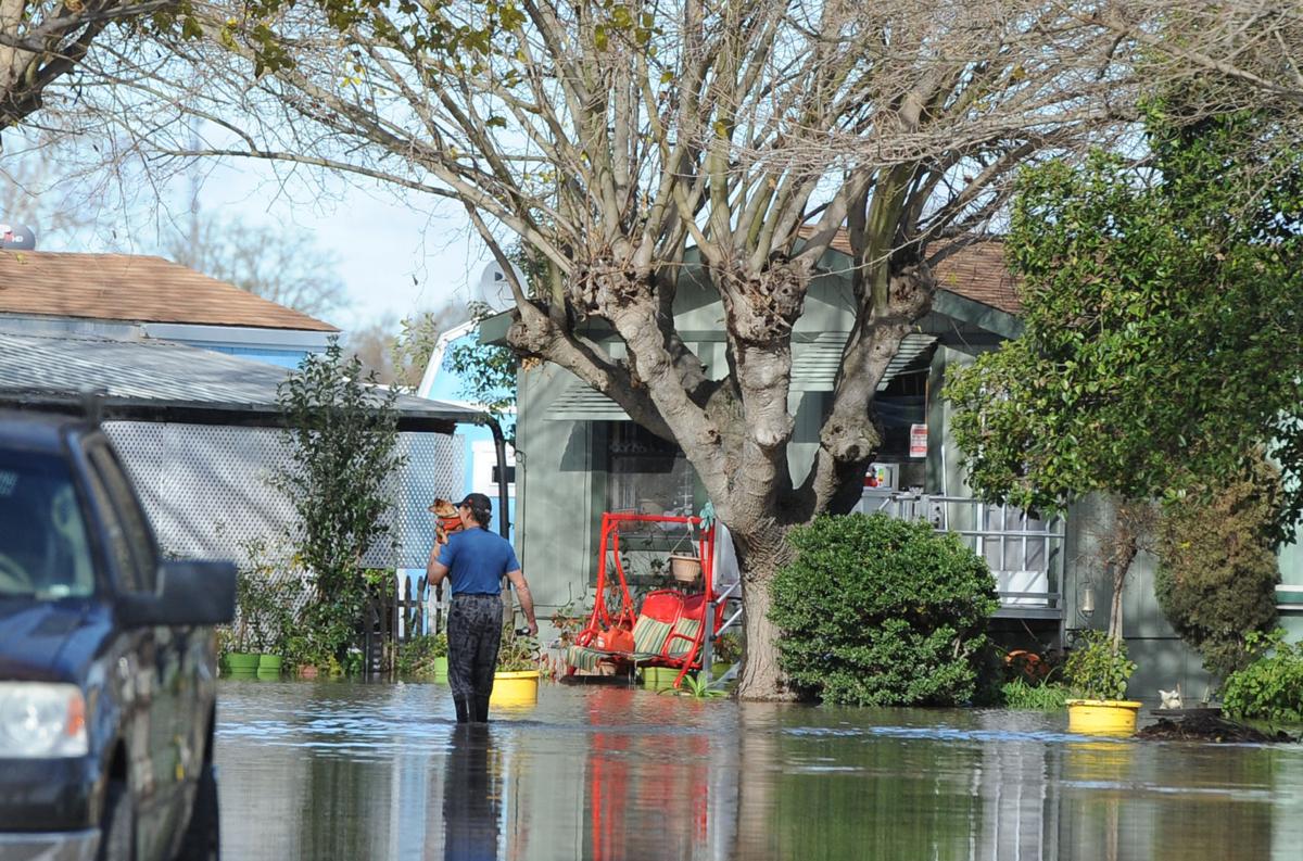 Troubled waters: Storm breaks levees, floods roads in Lodi area and ...