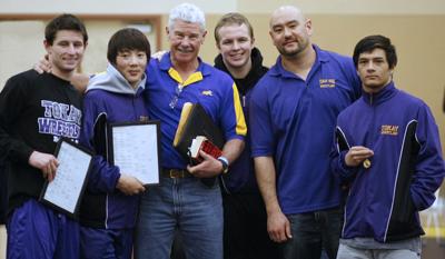 Three Tokay Tigers capture division crowns in wrestling and a fourth ...