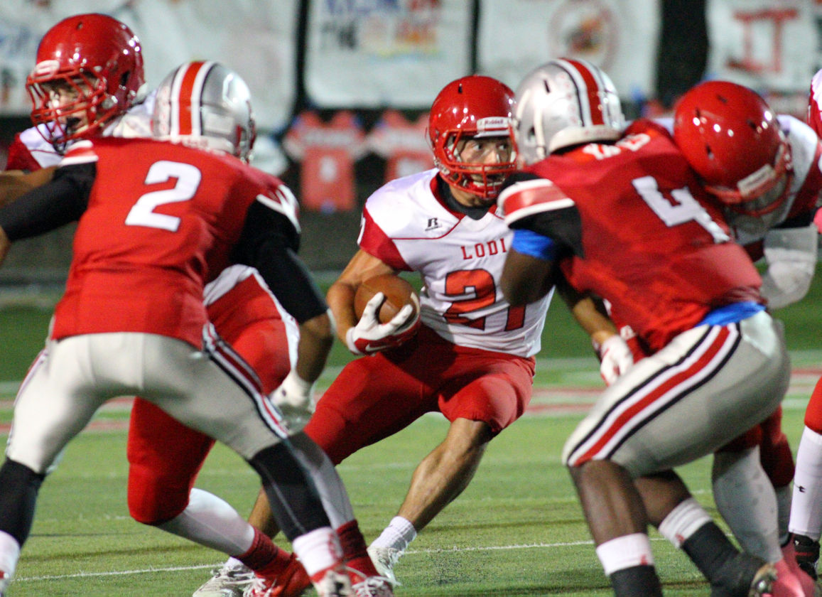 Football: Trojans smother Flames in Tri-City Athletic League thumping ...