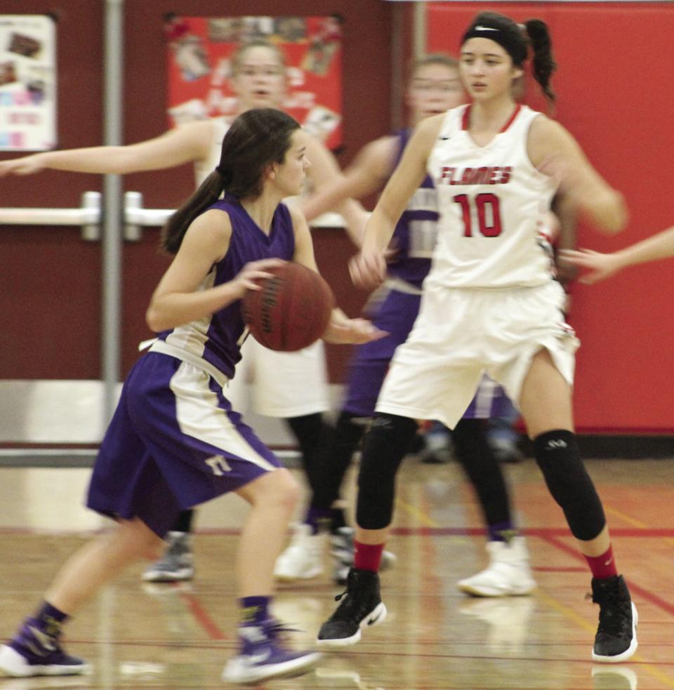 Girls basketball: Timely shots, opportunistic defense carry Flames over ...