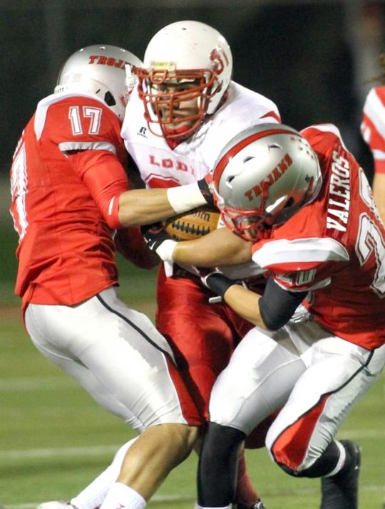 Daniel Frazier bowled over opponents on the mat and the gridiron ...