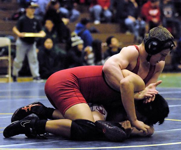 Wrestling: Lodi defends league title as four Flames win divisions ...