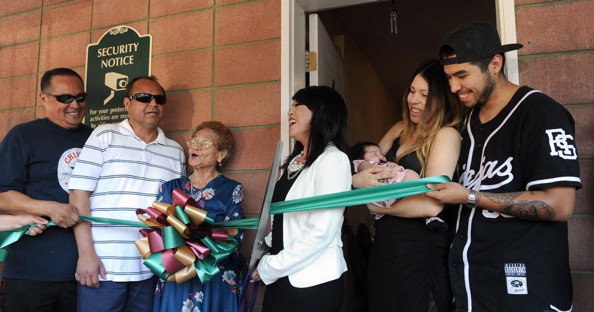 Maria Tamez and family celebrate ribbon cutting for MPH Insurance ...