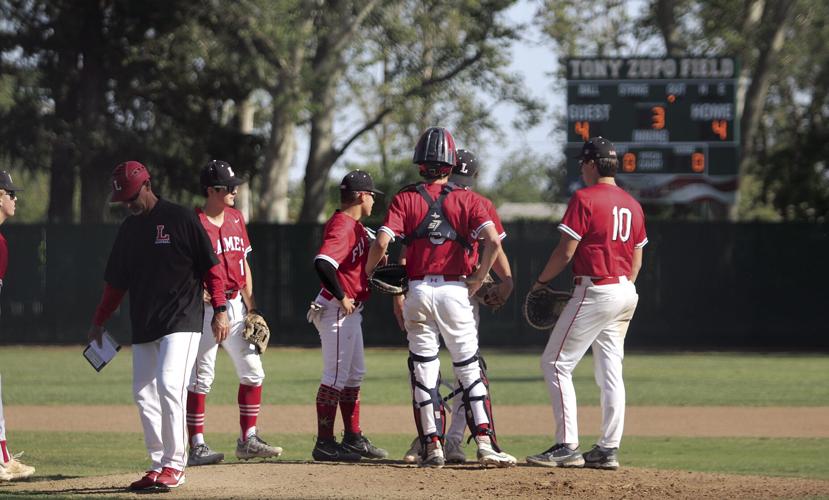 High schools: Flames pull away late to take two of three against Tigers ...