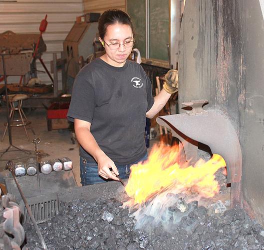 Lead blacksmith passes the torch to daughter | News | logandaily.com