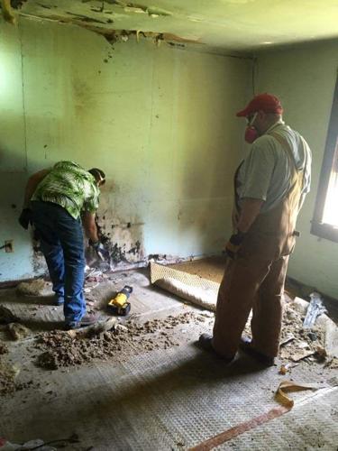 Locals help homeowners rebuild in West Virginia | News | logandaily.com