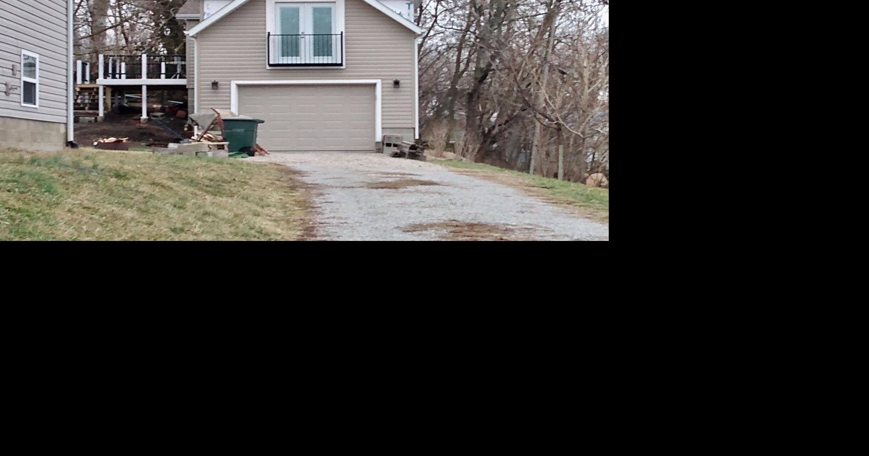 City settles with homeowner in zoning dispute over garage setback ...