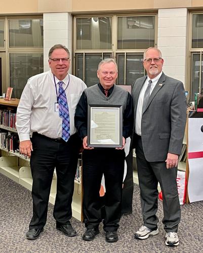 School board honors outgoing county auditor | News | logandaily.com