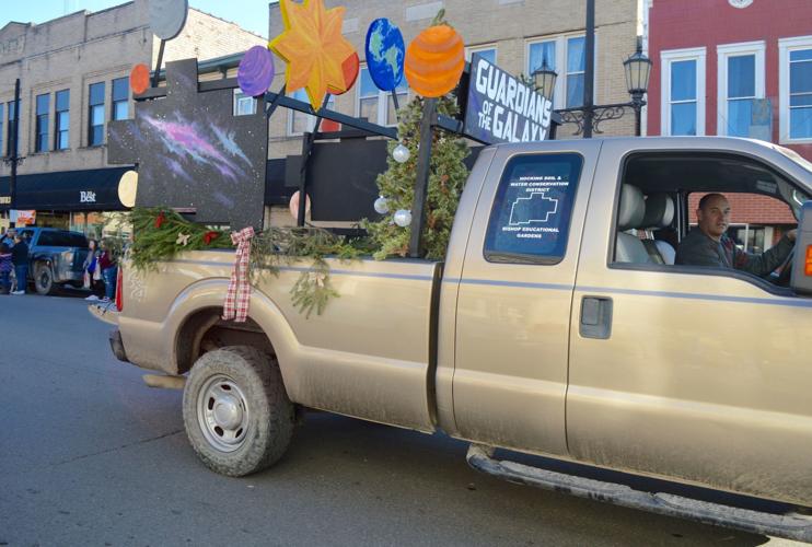 Logan's superheroes brighten the Christmas parade | News | logandaily.com