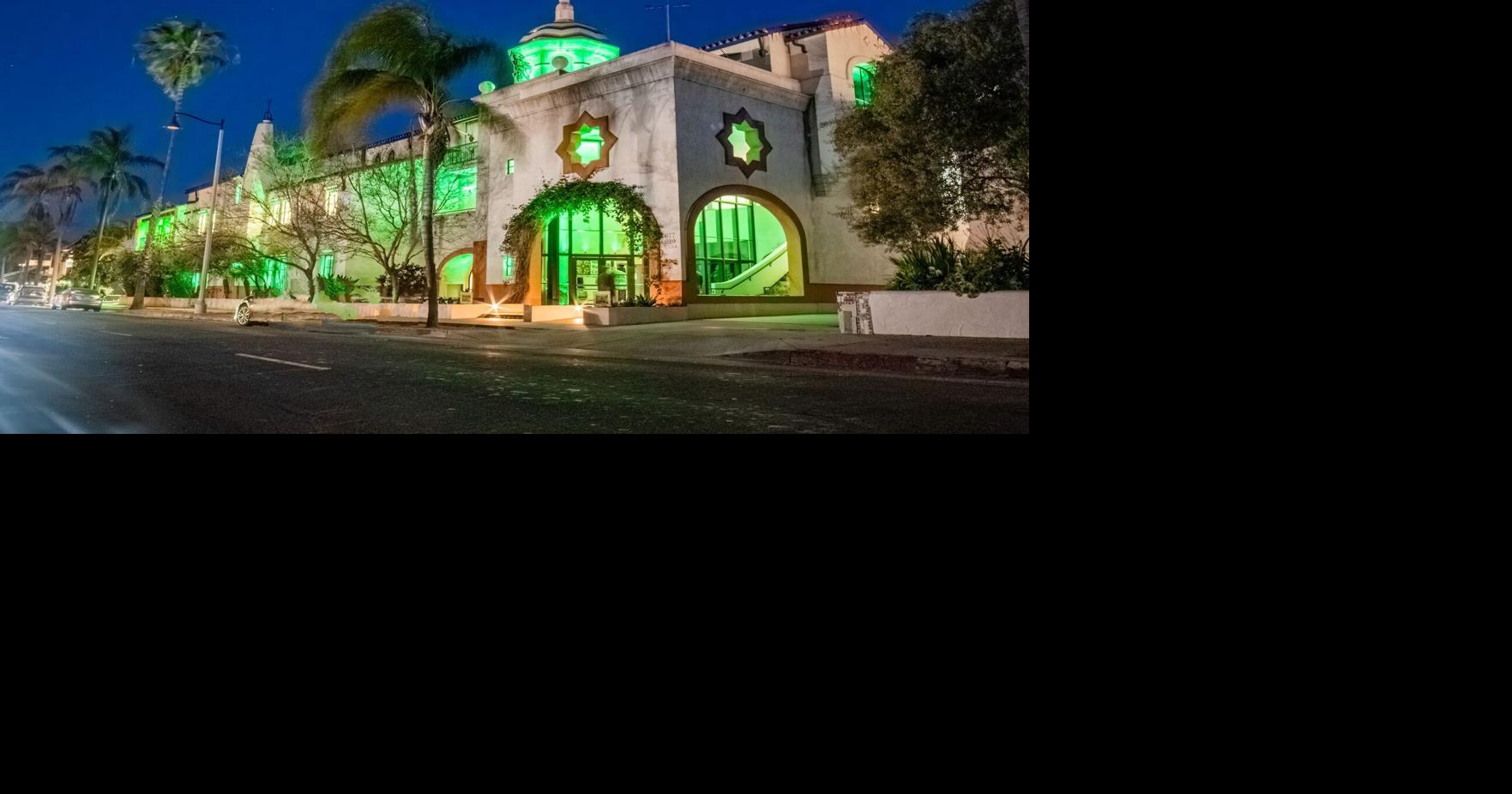 Buildings across Santa Barbara County illuminated in green in ...
