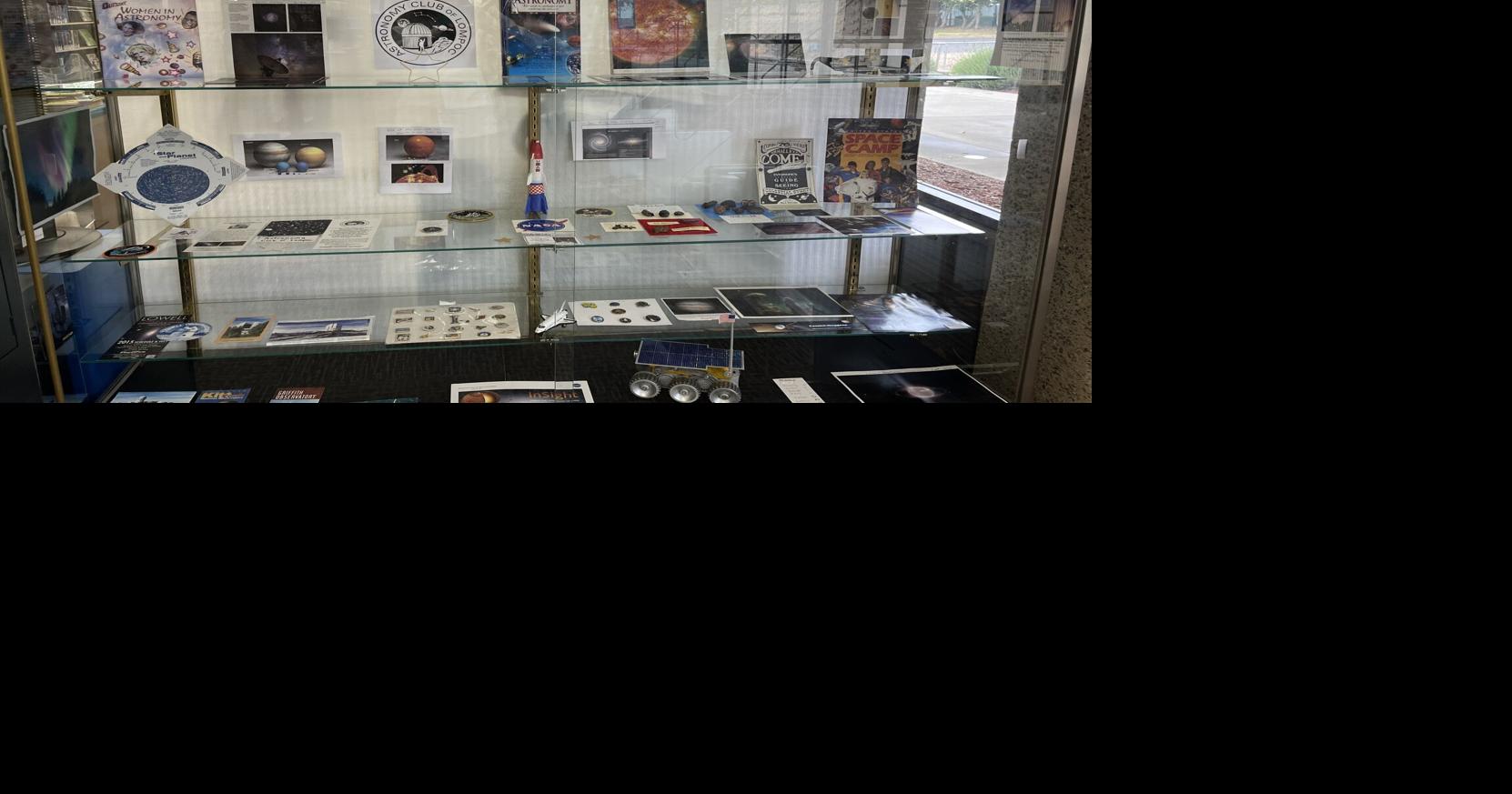 Local astronomy club president showcasing space-related collection at ...