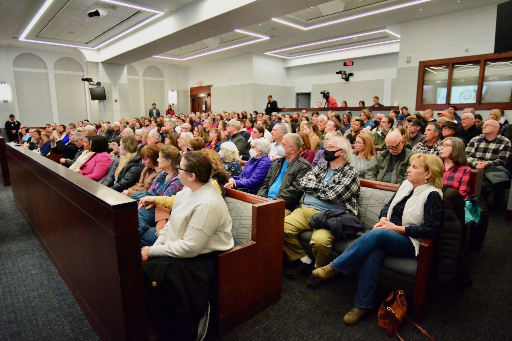 Fearful, Angry Federal Workers Fill Boardroom for Subramanyam’s Town ...