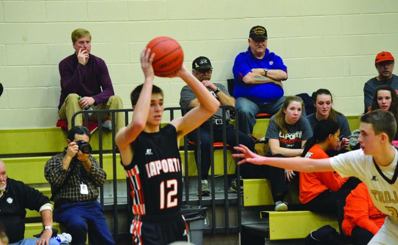 Trojans win pair of close hoops contests | Sports | lpheralddispatch.com