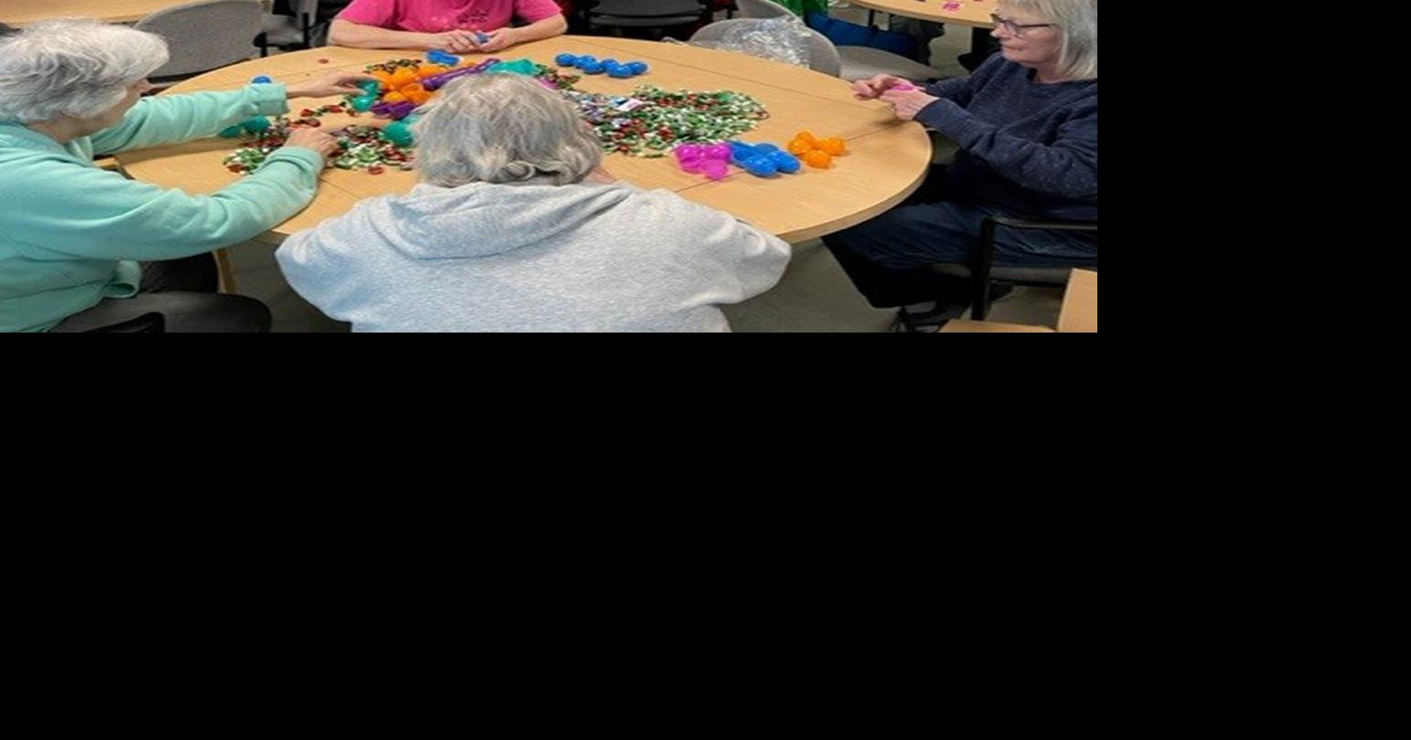 Volunteer Easter bunnies stuff eggs for annual Michigan City hunt | On ...