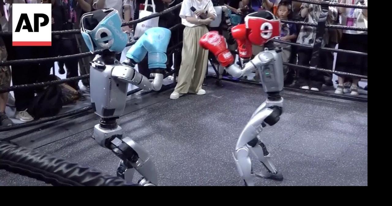 Robots fight in a boxing match at World Robot Expo in China | Ap Video ...