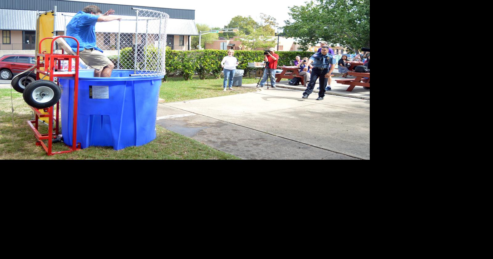 Dunking booth raises domestic violence awareness | Local & State ...